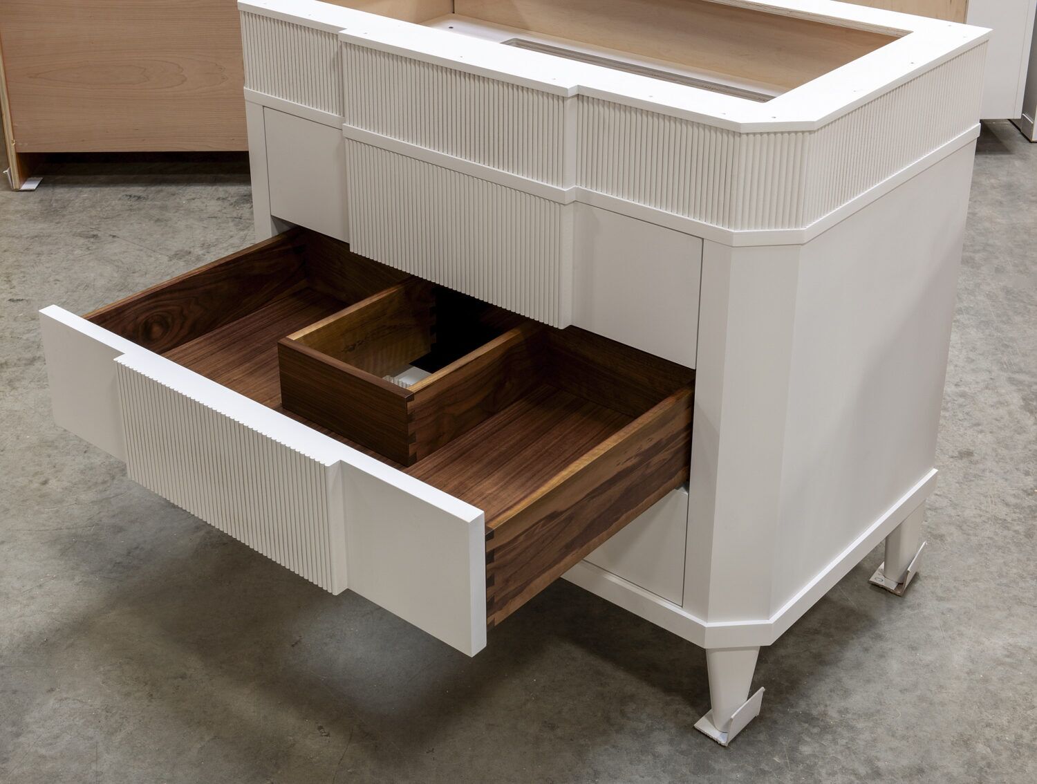Reeded Vanity with Pipe Chase Drawers - Crown Point Cabinetry